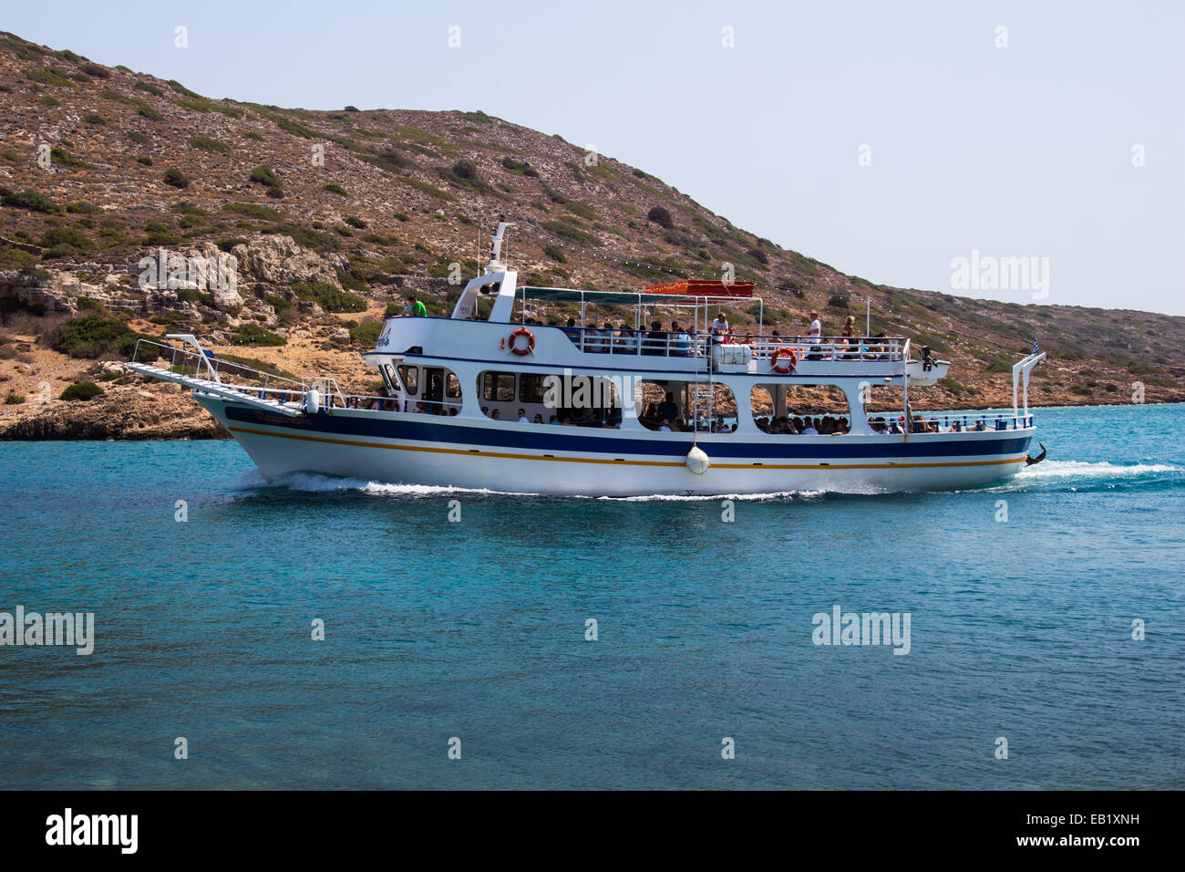 Excursion boat in Crete, ferrying tourists to the old leper colony ...