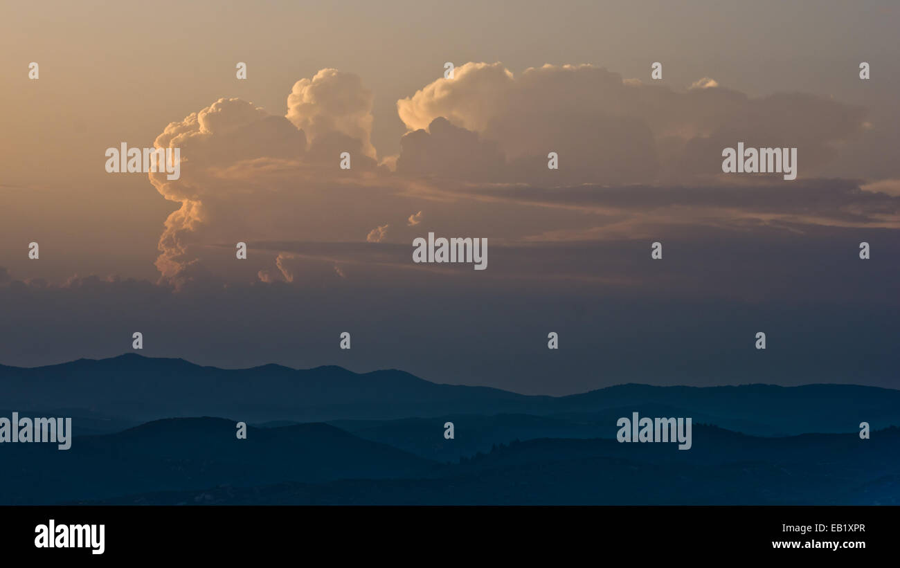 Sunset over hills wallpaper hi-res stock photography and images - Alamy
