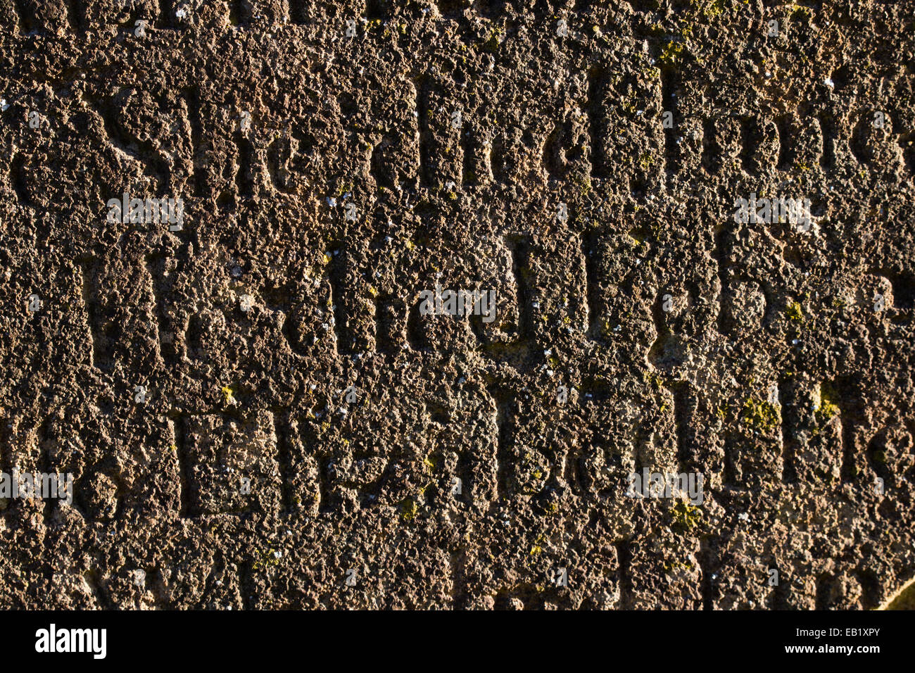 Letters carved in stone Stock Photo - Alamy