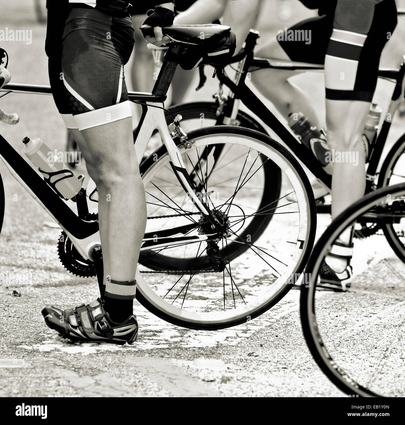 Bicycle riders at a rest stop during a race Stock Photo - Alamy