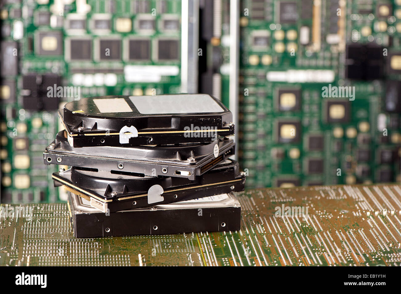 pile of hard drives and motherboard Stock Photo - Alamy