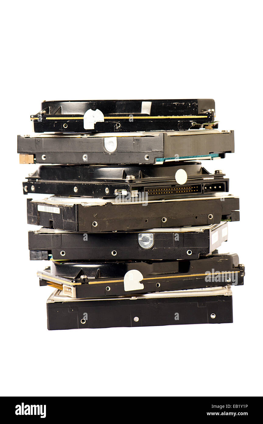 isolated pile of hard disk at white background Stock Photo - Alamy