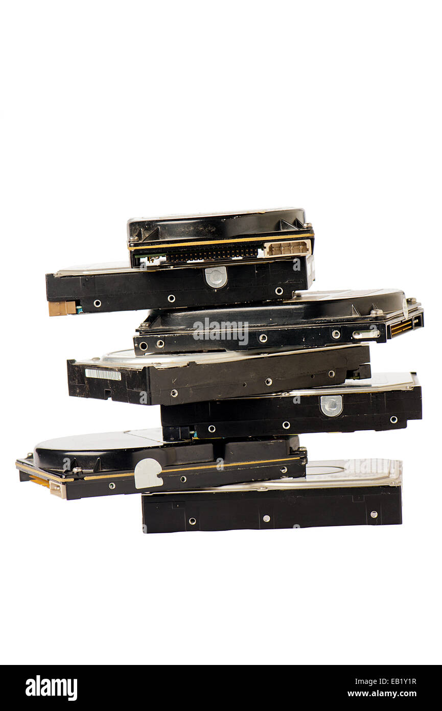 isolated pile of hard drives at white background Stock Photo - Alamy