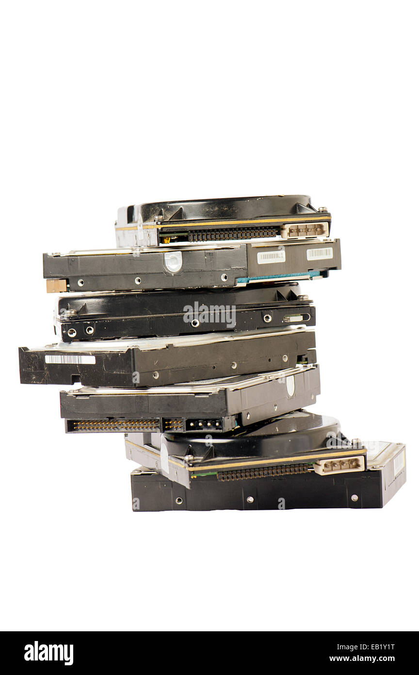 isolated pile of hard disc at white background Stock Photo - Alamy