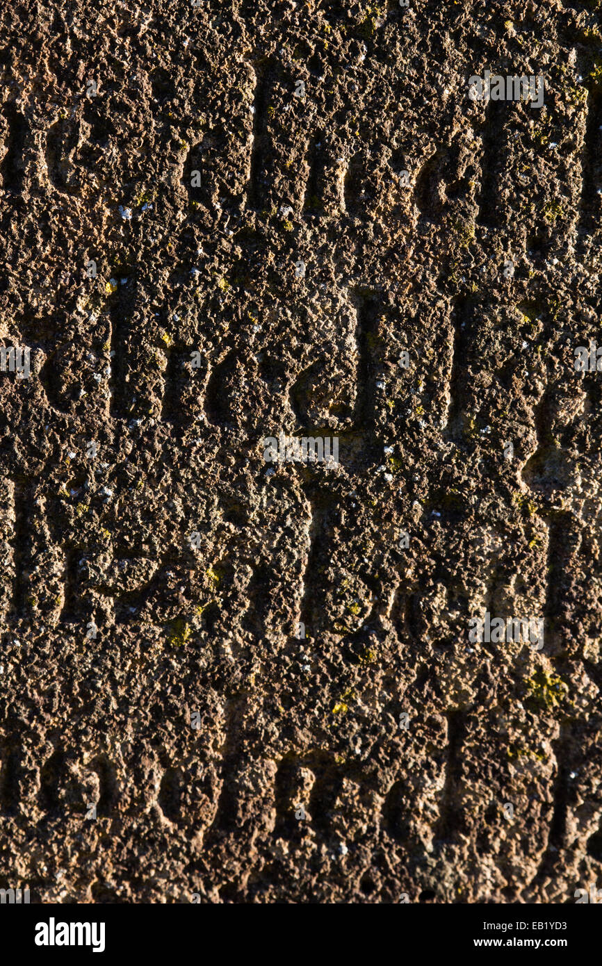 Letters carved in stone Stock Photo - Alamy
