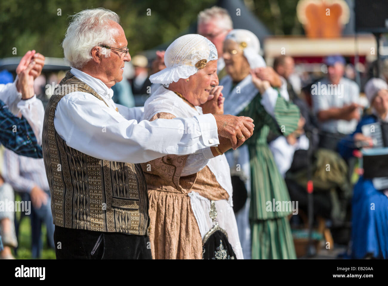 Elderly man and woman demonstrating an old Dutch folk dance Stock Photo ...