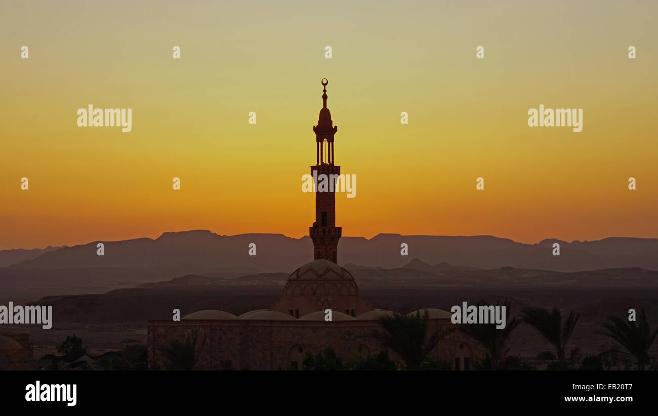 sunset over mosque in egypt Stock Photo - Alamy