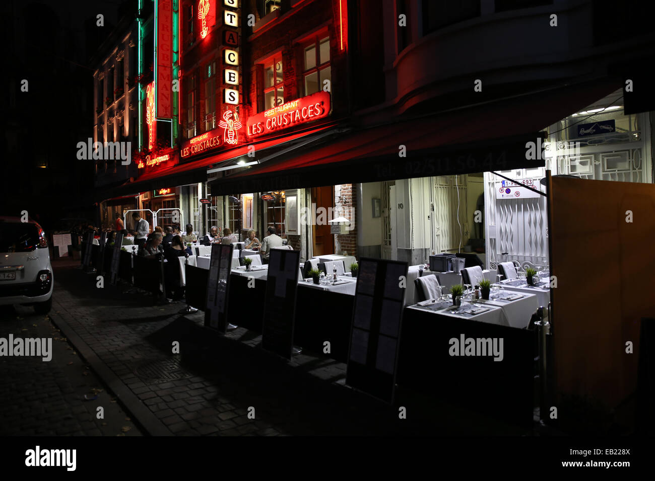 half empty outdoor restaurant patio night brussels Stock Photo - Alamy