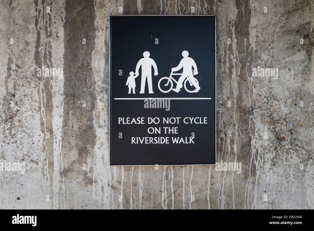 Wall sign with 'please do not cycle on riverside walk' by the River ...