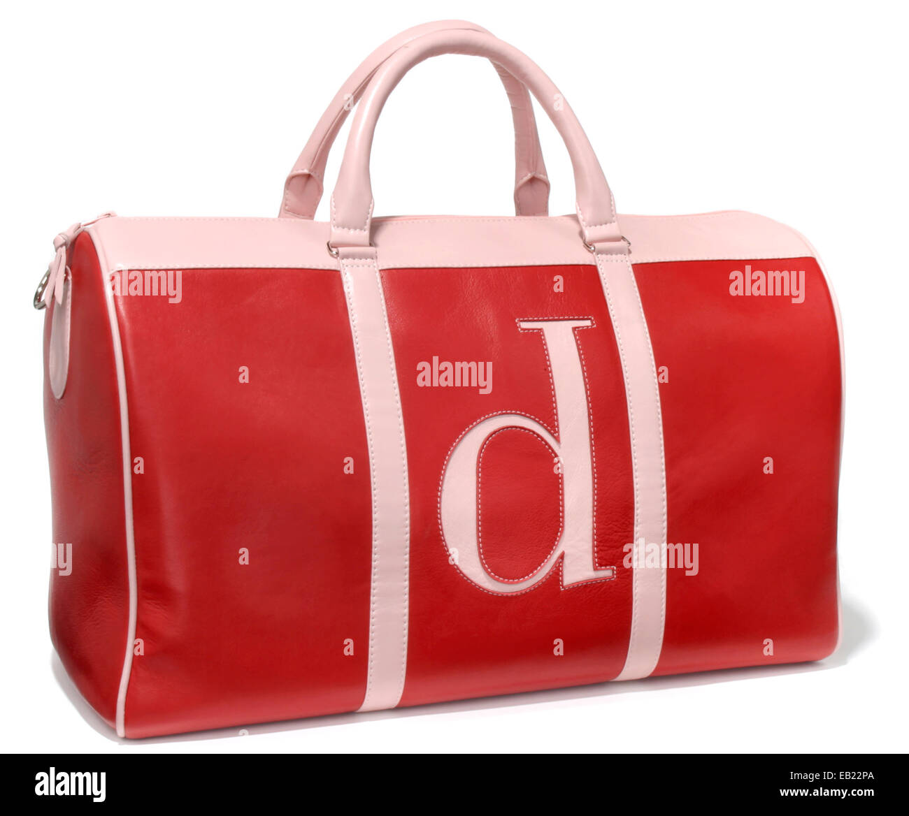 Red and pink letter D leather duffel bag photographed on a white ...