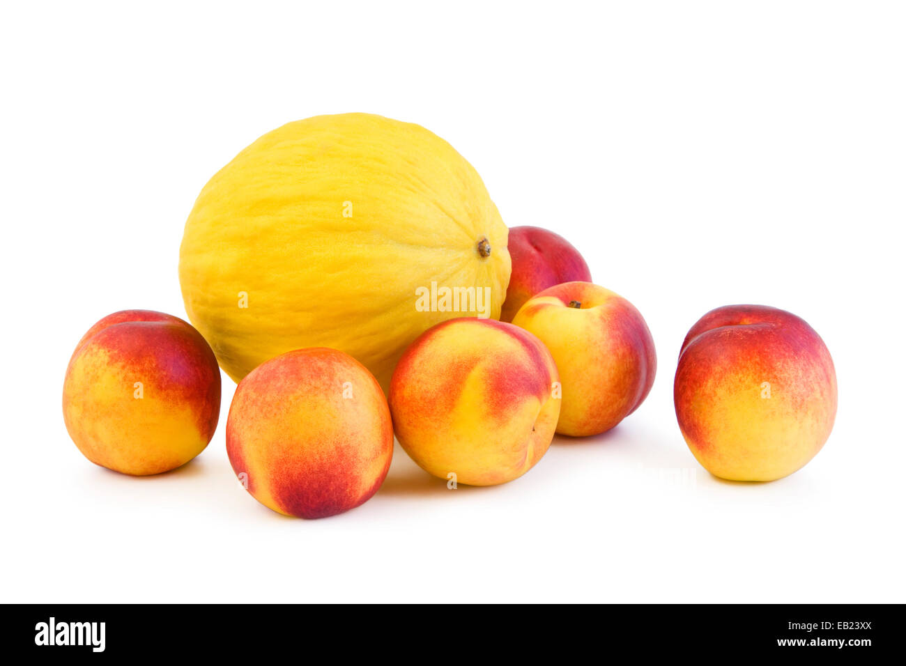 Fresh peaches and yellow melon fruit isolated on white Stock Photo - Alamy