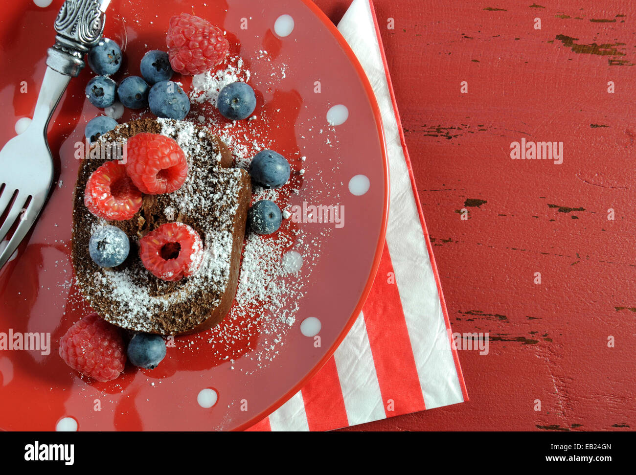 Christmas holiday chocolate roulade swiss roll with berries dessert ...