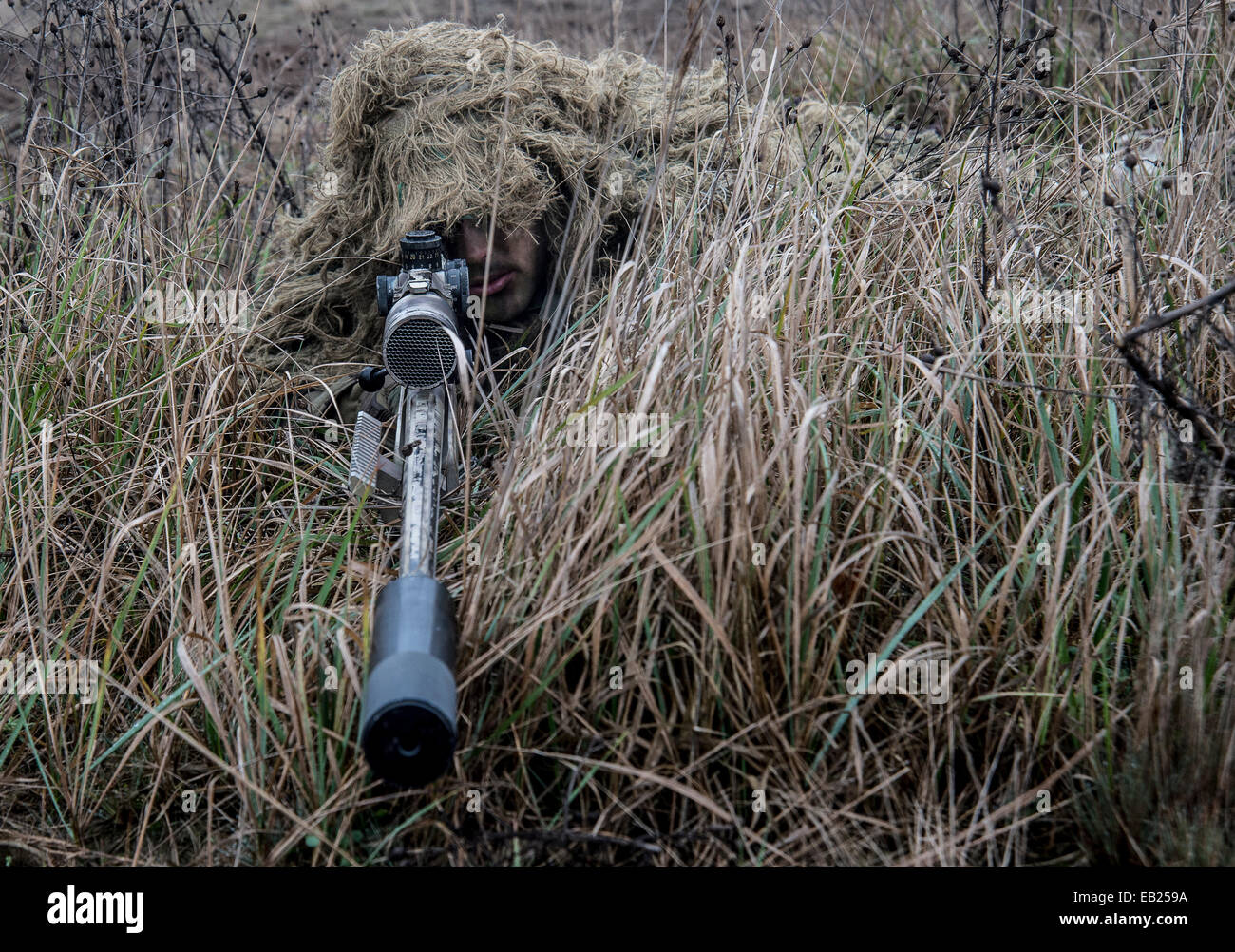 British sniper with his L115A3 long range sniper rifle on exercise in ...