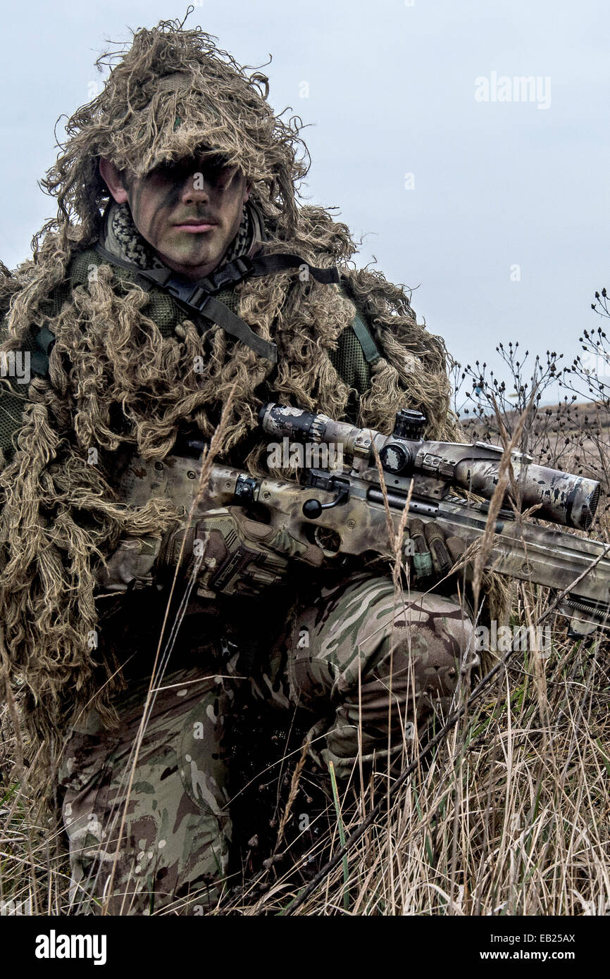 British sniper with his L115A3 long range sniper rifle on exercise in ...
