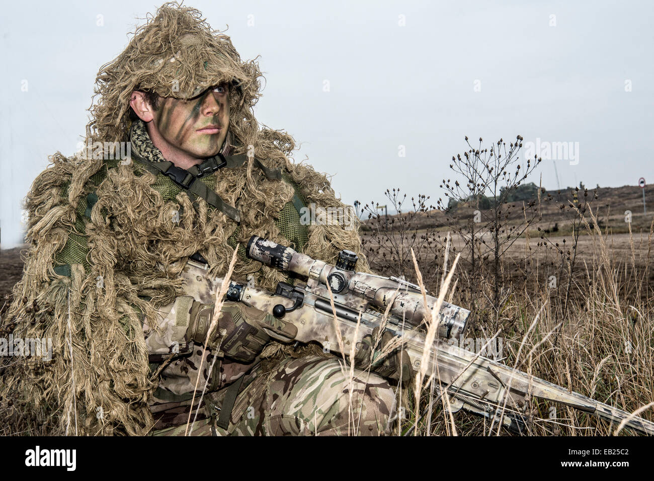 British sniper with his L115A3 long range sniper rifle on exercise in ...