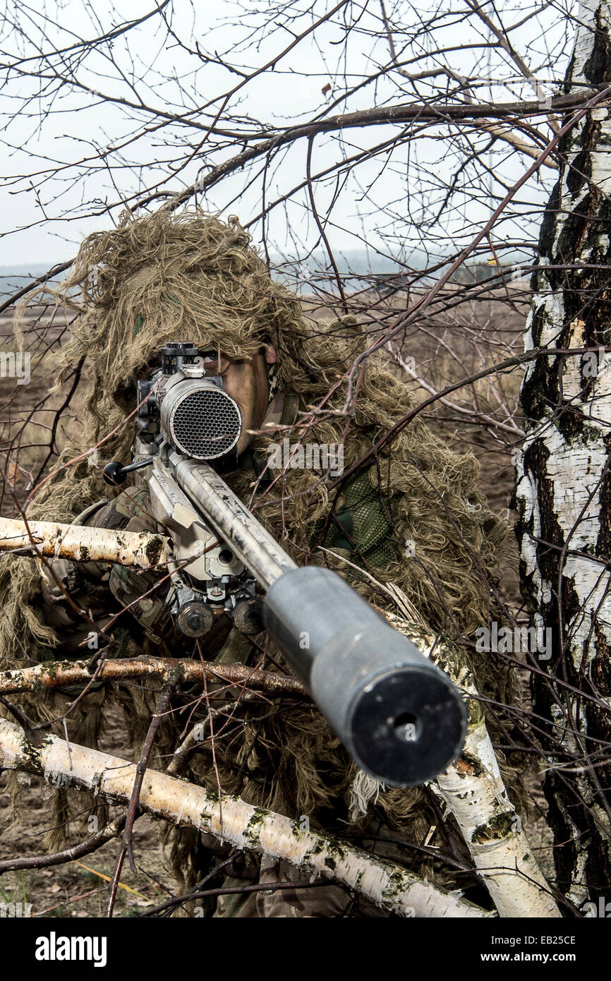 British sniper with his L115A3 long range sniper rifle on exercise in ...