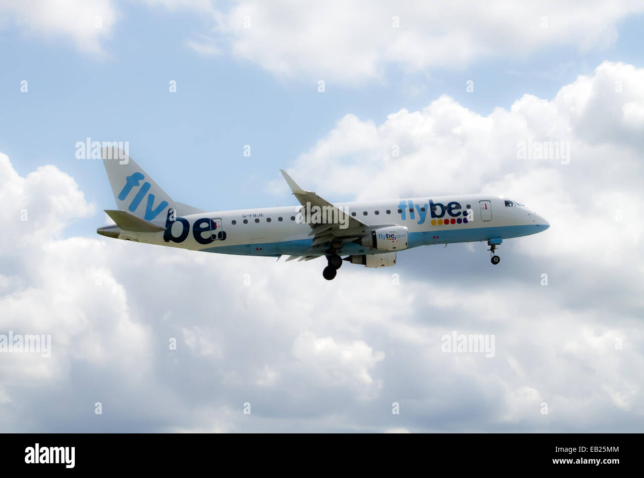 Flybe Embraer 175 landing to Manchester International Airport Stock ...