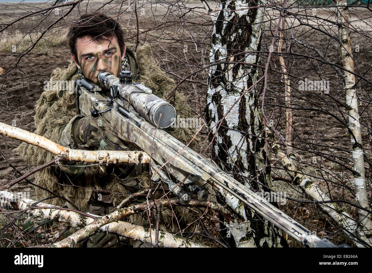 British sniper with his L115A3 long range sniper rifle on exercise in ...