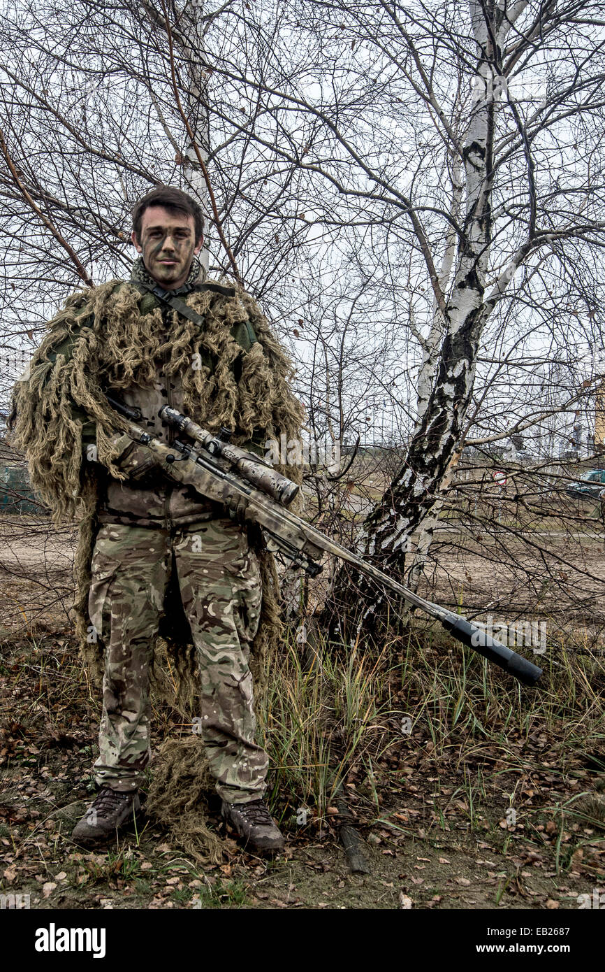 British sniper with his L115A3 long range sniper rifle on exercise in ...