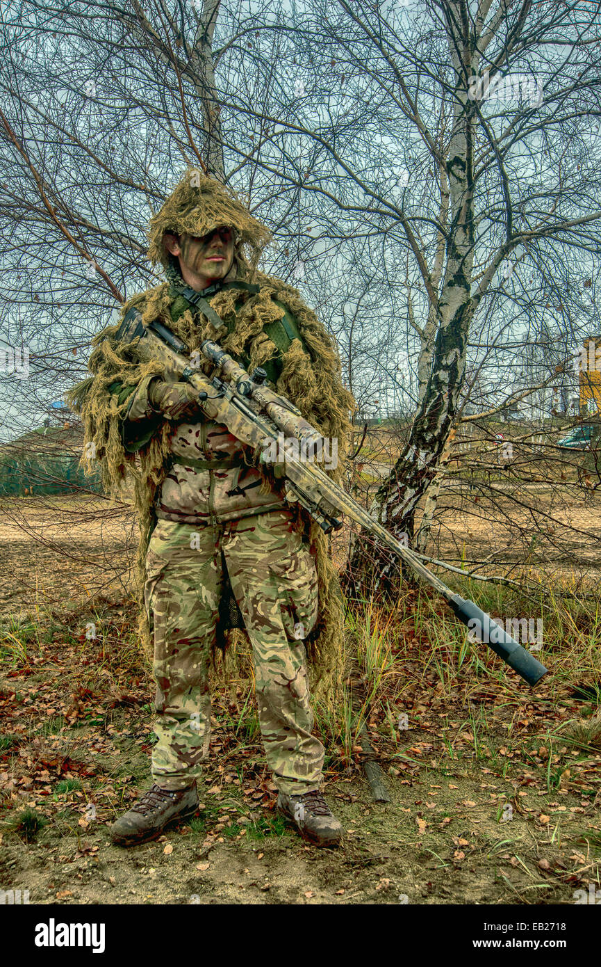 British sniper with his L115A3 long range sniper rifle on exercise in ...