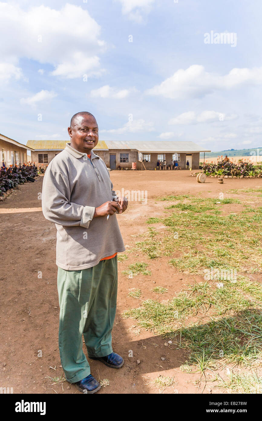 An African headmaster of a primary school in the Sinya area of Northern ...