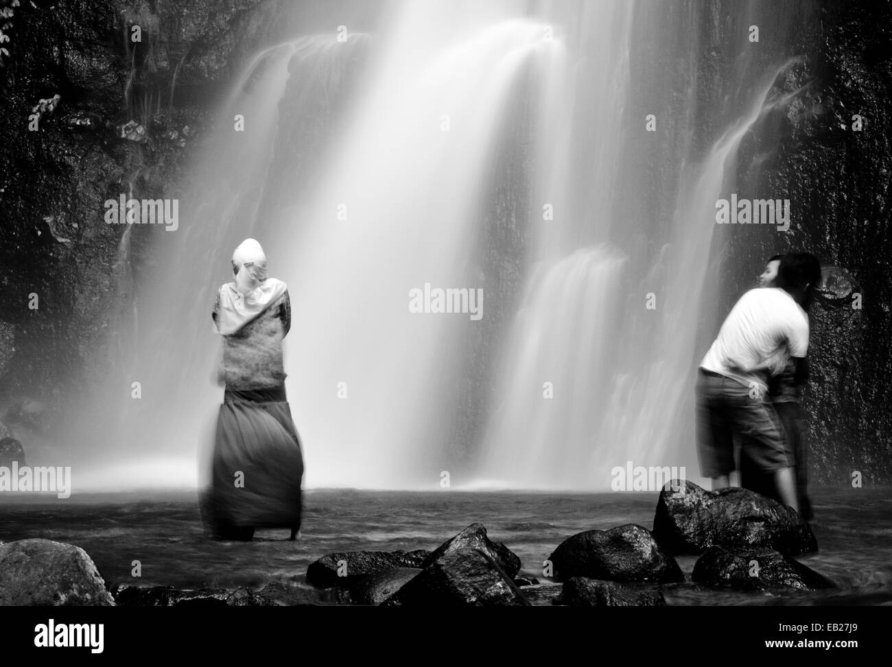 Couple embraces in this black and white high contrast image of love in ...