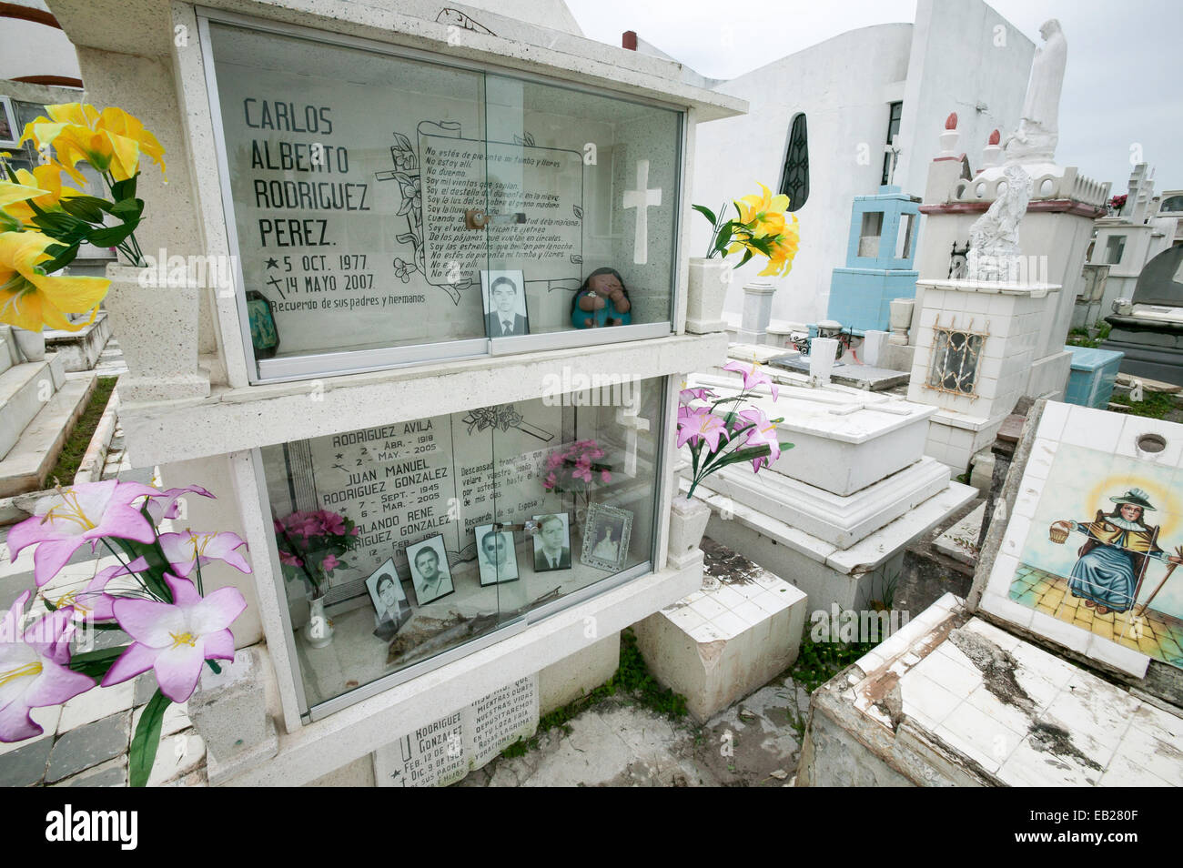 Mexican cemetery showing white stacked above ground graves with ...