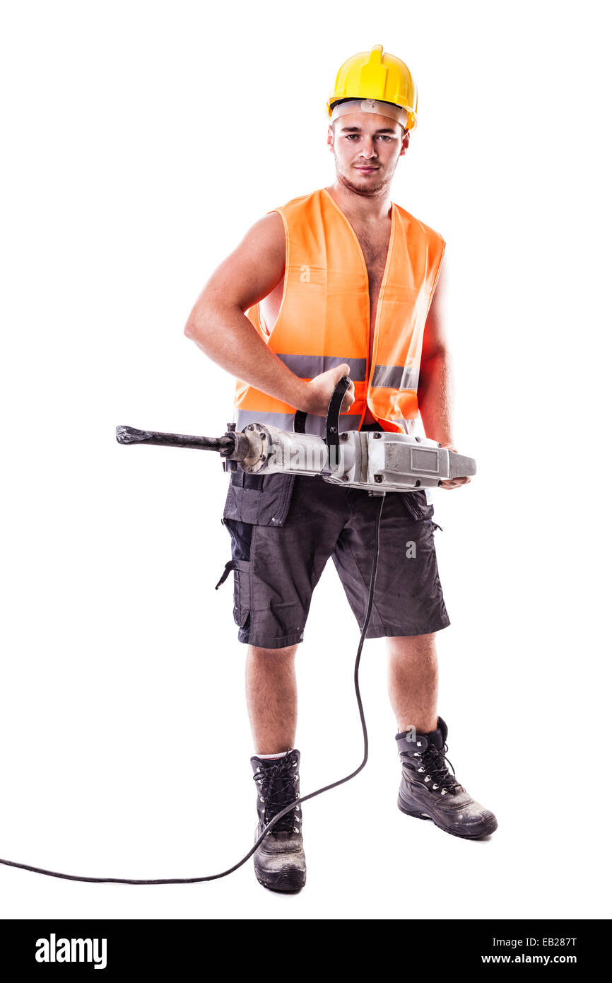 a young road worker wearing a hardhat and a visibility vest holding a ...