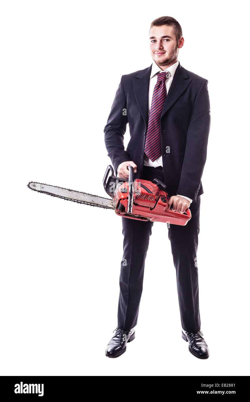 a young businessman holding a red chainsaw isolated over a white ...
