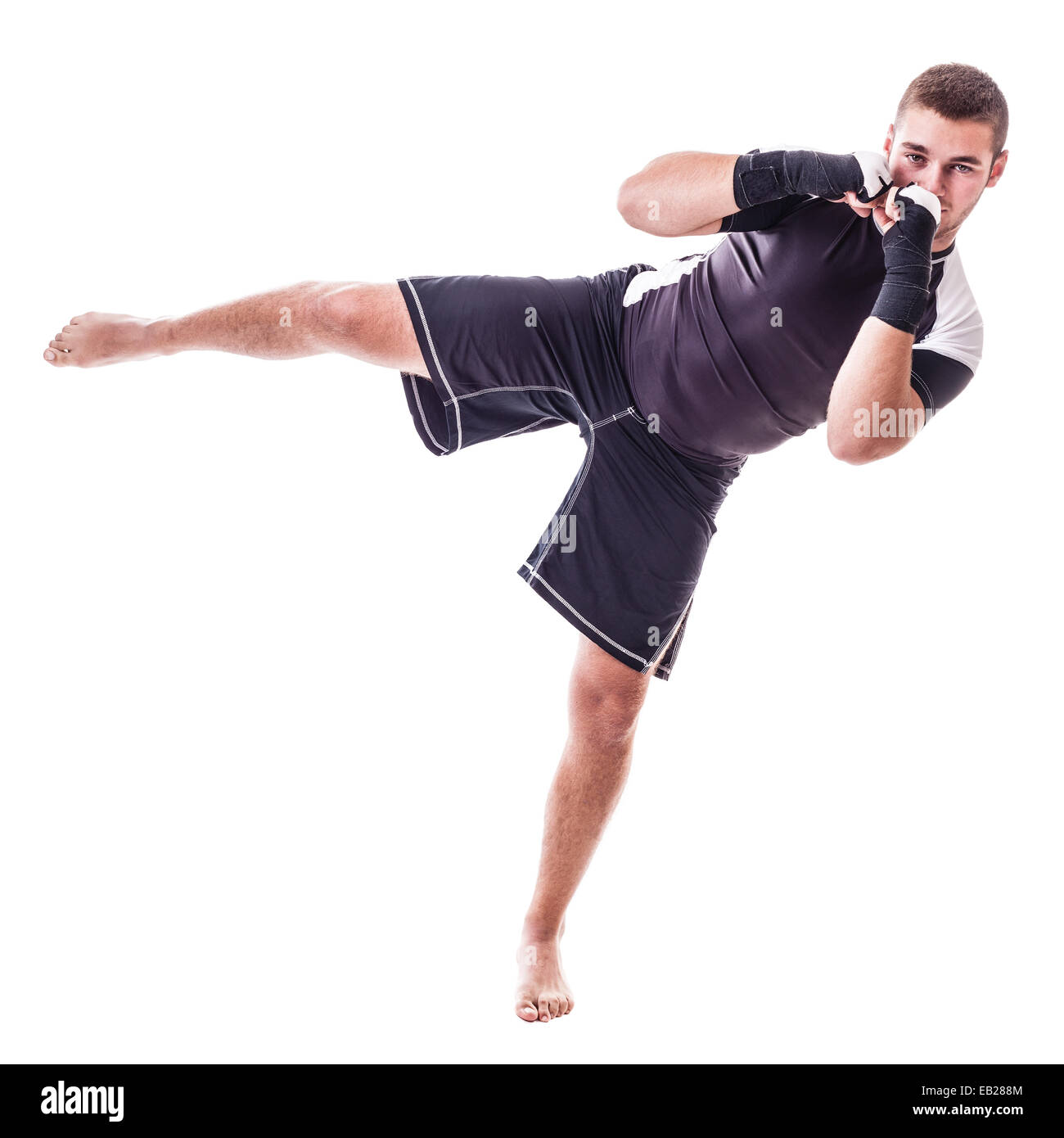 a young kickboxer or boxer isolated over a white background Stock Photo ...