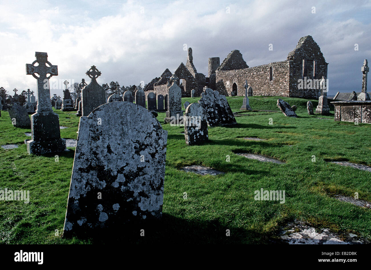 CELTIC CROSS GRAVES AT CLONMACNOISE MONASTERY ON THE BANKS OF THE ...