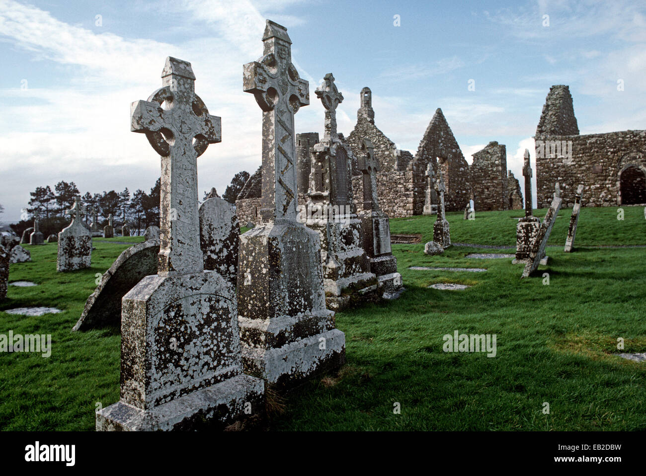 CELTIC CROSS GRAVES AT CLONMACNOISE MONASTERY ON THE BANKS OF THE ...