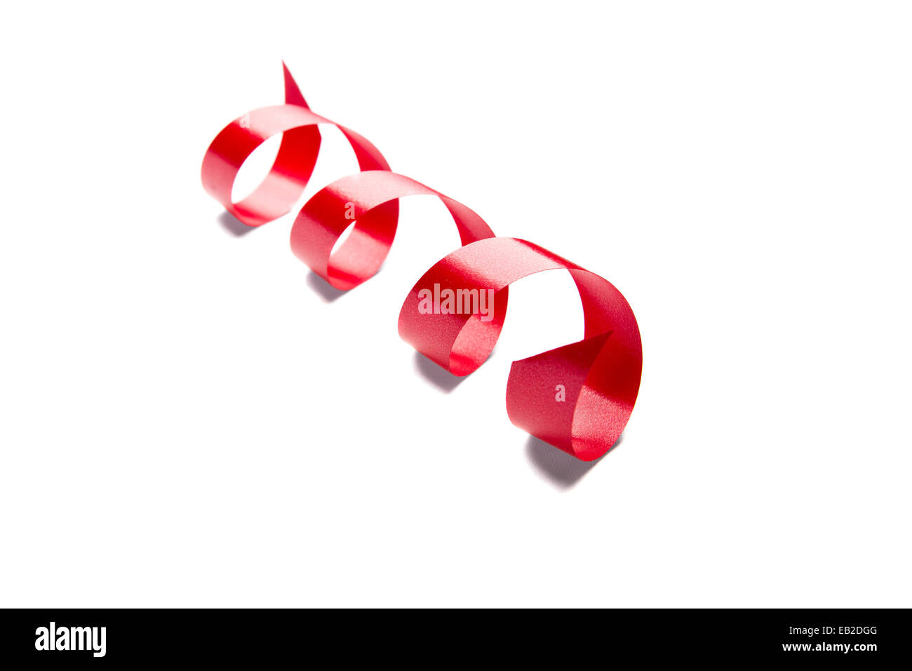 red ribbon isolated over white background Stock Photo - Alamy