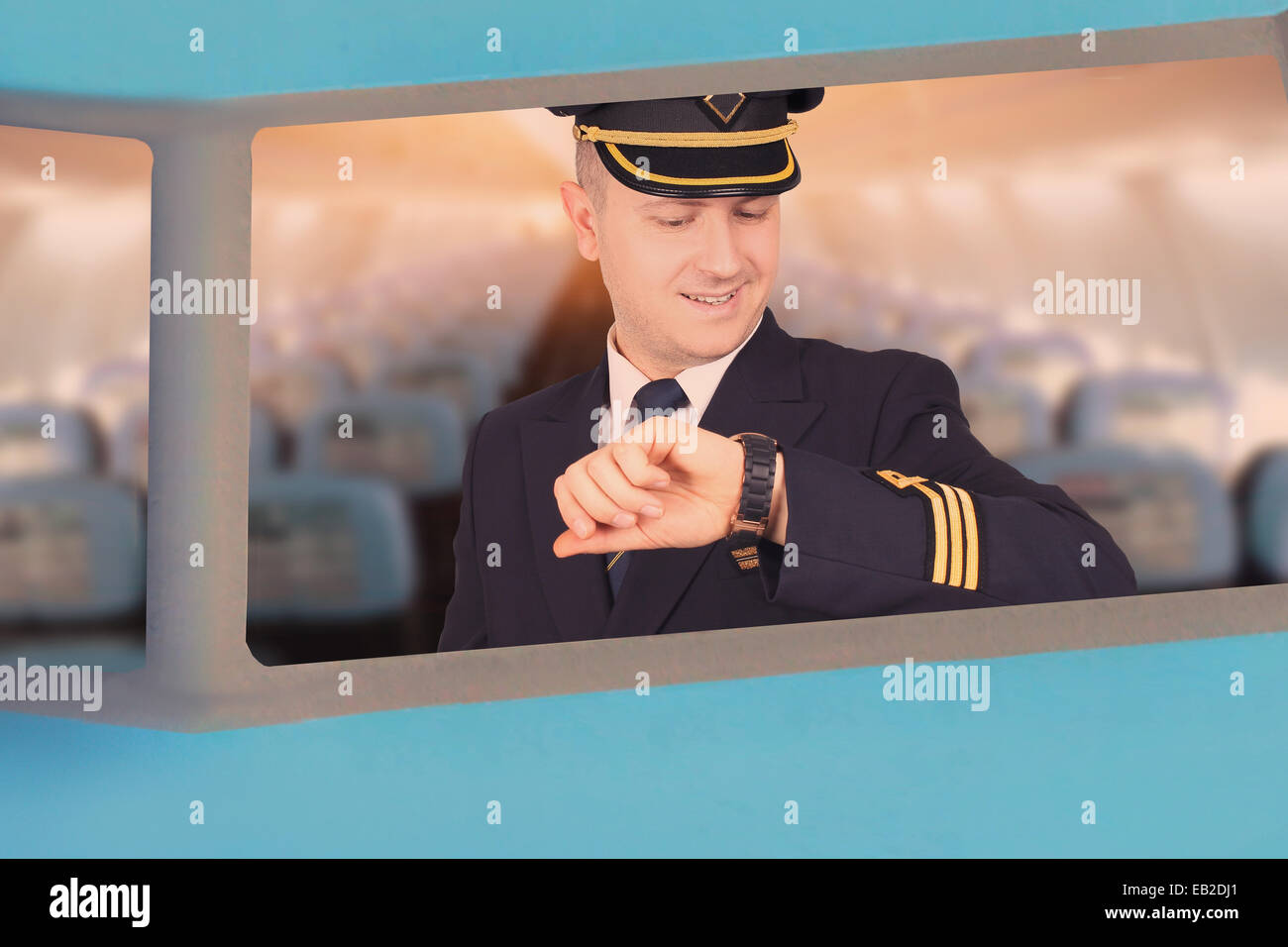 pilot looks at his watch in the cockpit Stock Photo - Alamy