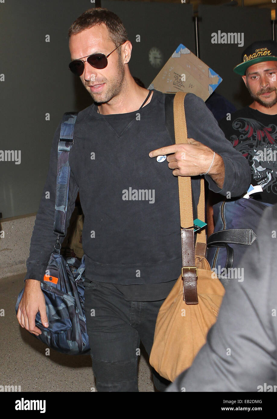 Chris Martin arrives at Los Angeles International (LAX) airport ...