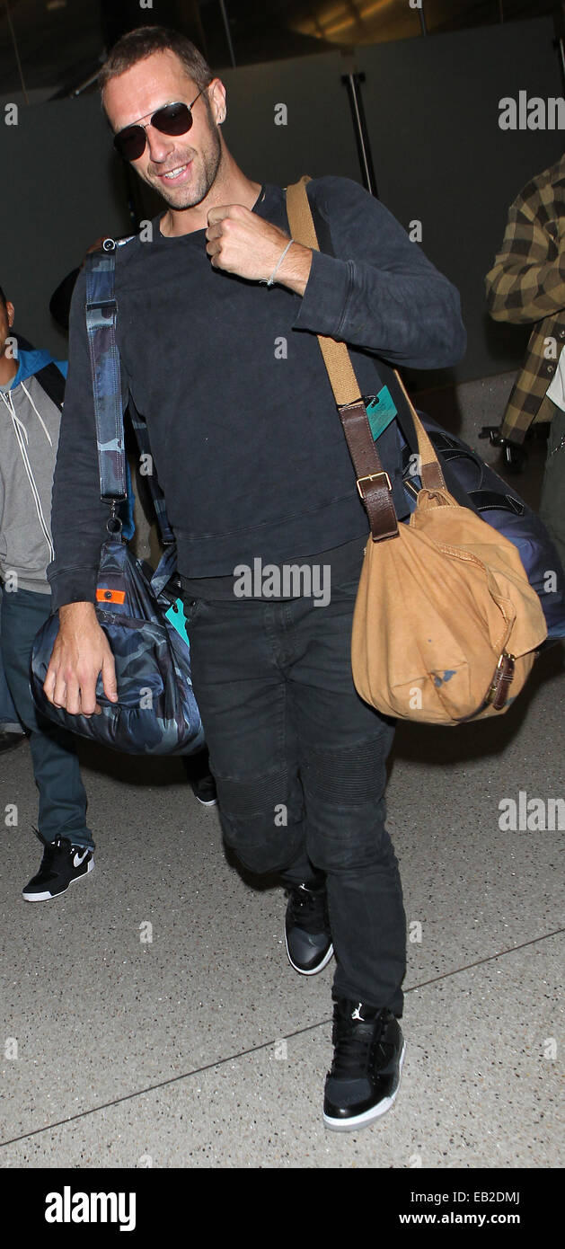 Chris Martin arrives at Los Angeles International (LAX) airport ...