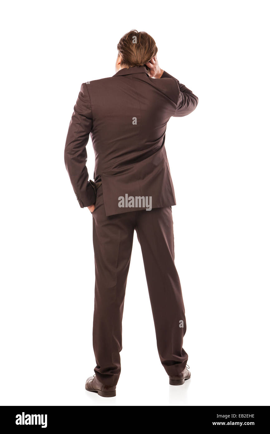 business man from the back looking at something isolated over white ...