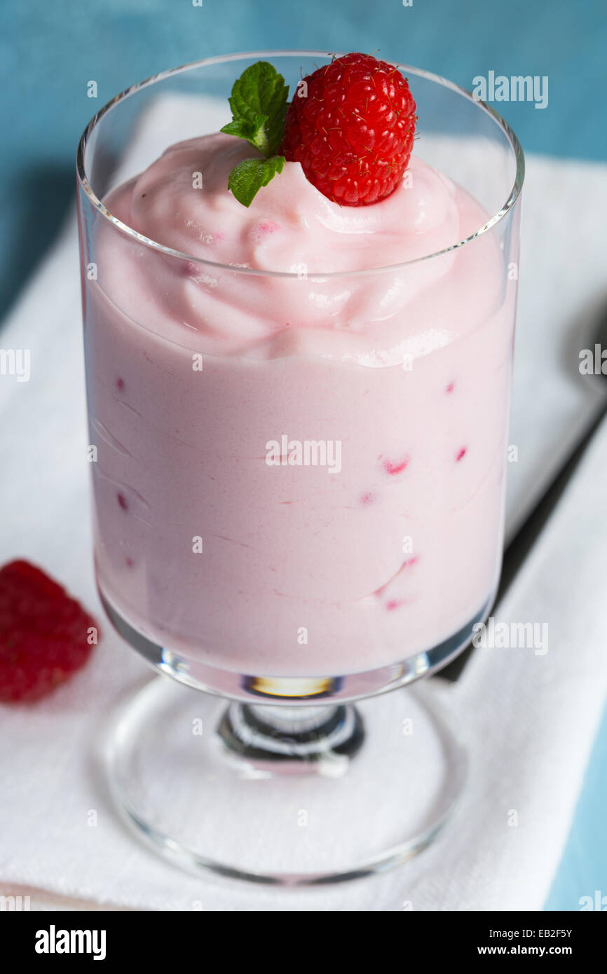 Raspberry cream dessert with mint Stock Photo - Alamy