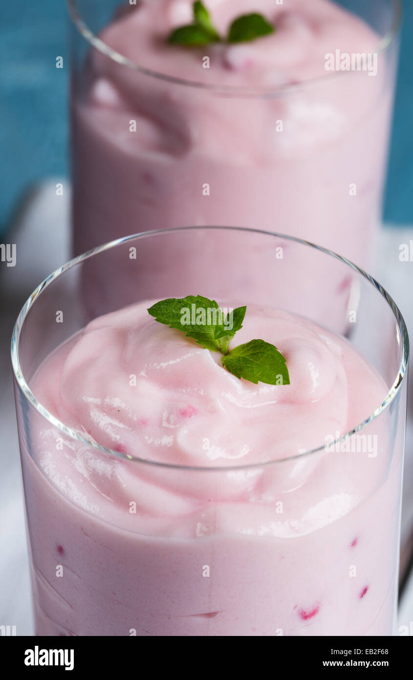 Raspberry cream dessert with mint Stock Photo - Alamy