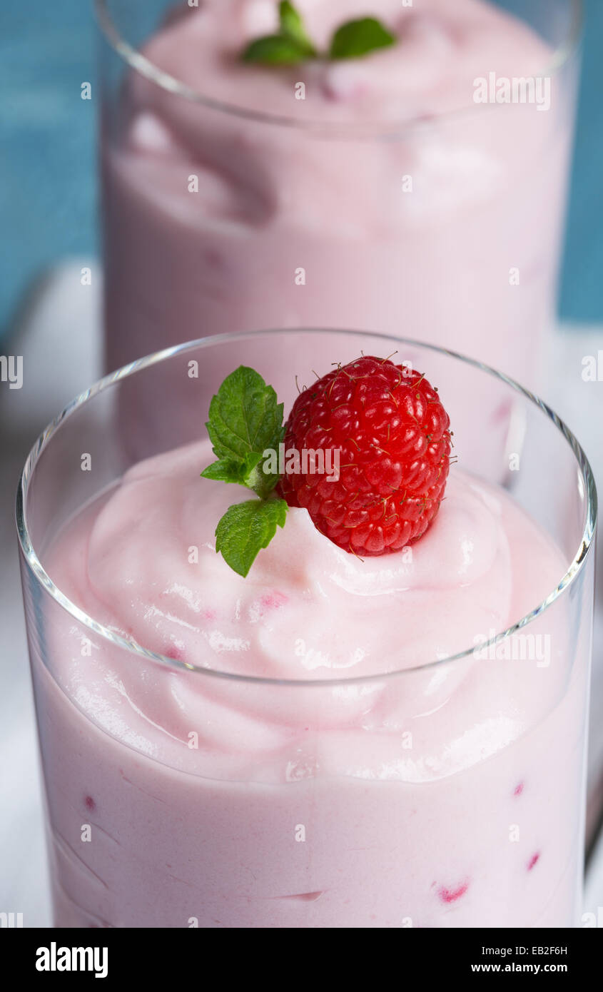 Raspberry cream dessert with mint Stock Photo - Alamy