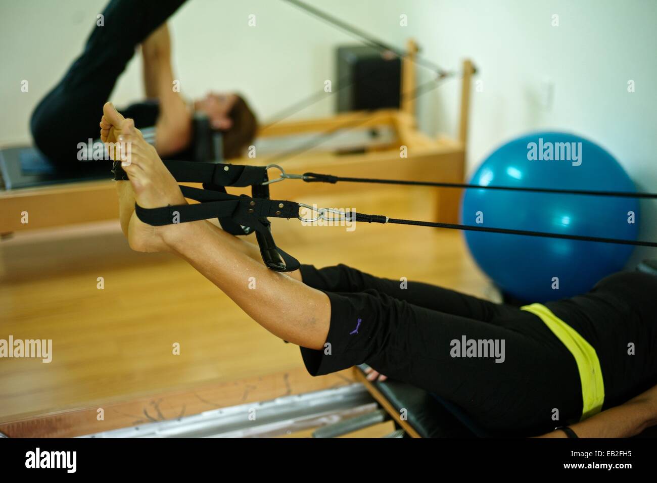 Women practice pilates in a fitness studio Stock Photo - Alamy