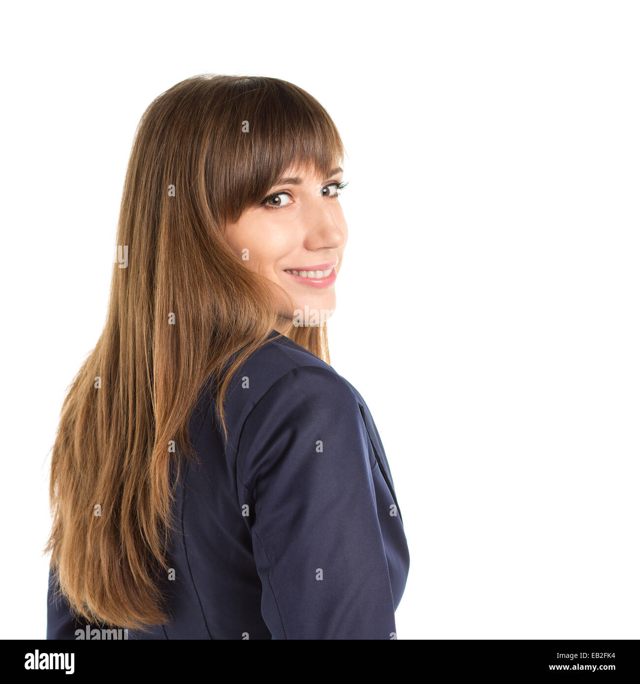 Young happy business woman glancing over shoulder isolated on white ...
