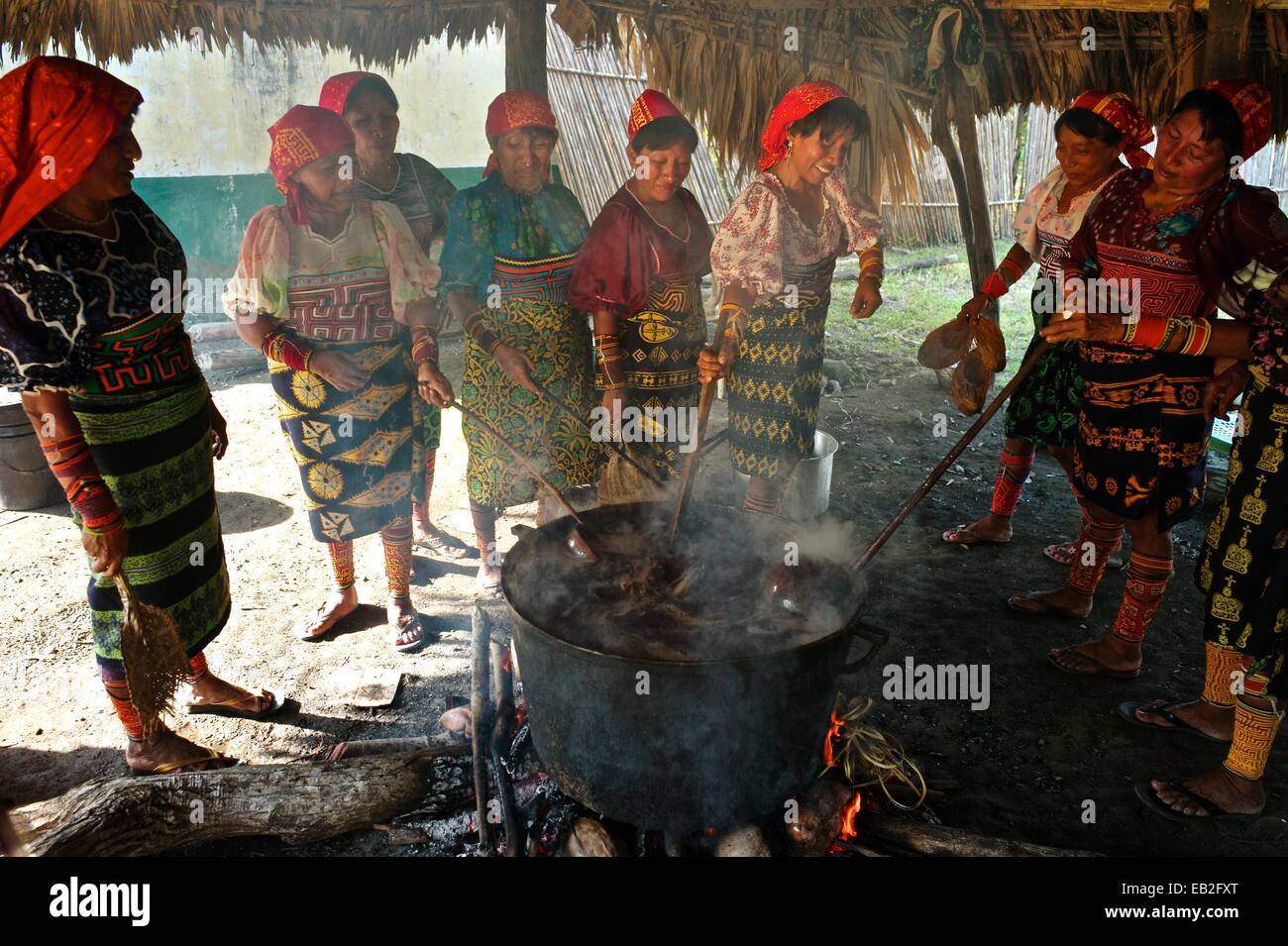 Cuna women cooking chicha. Among the Cuna or Gundetule of the San Blas ...