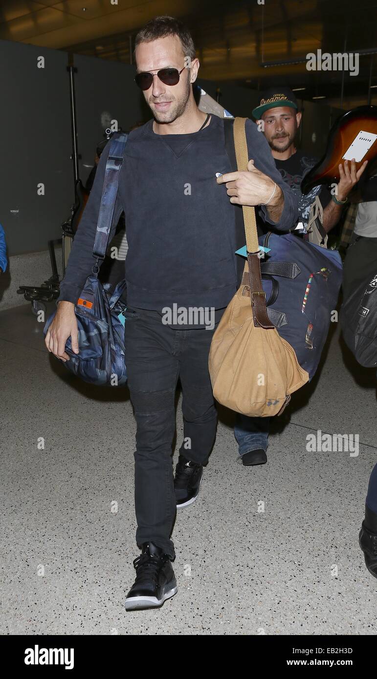 Chris Martin arrives at Los Angeles International (LAX) airport ...