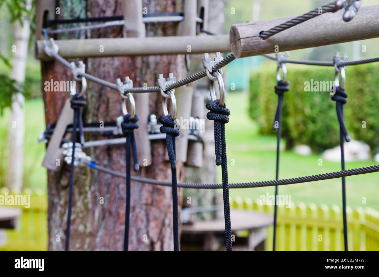 adventure climbing high wire park Stock Photo - Alamy