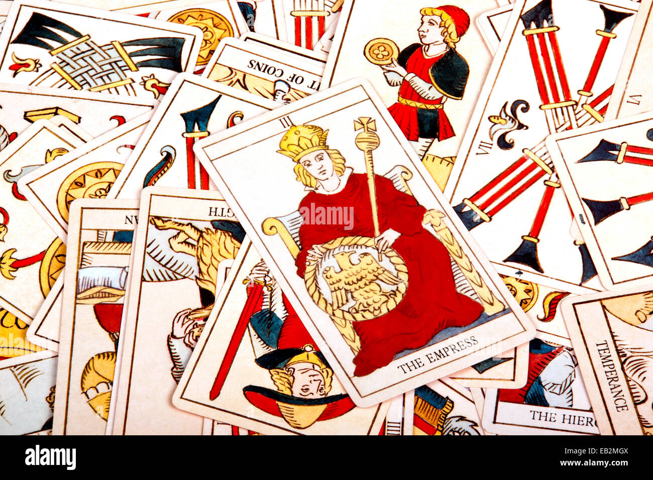 large scattered collection of colorful tarot cards Stock Photo - Alamy