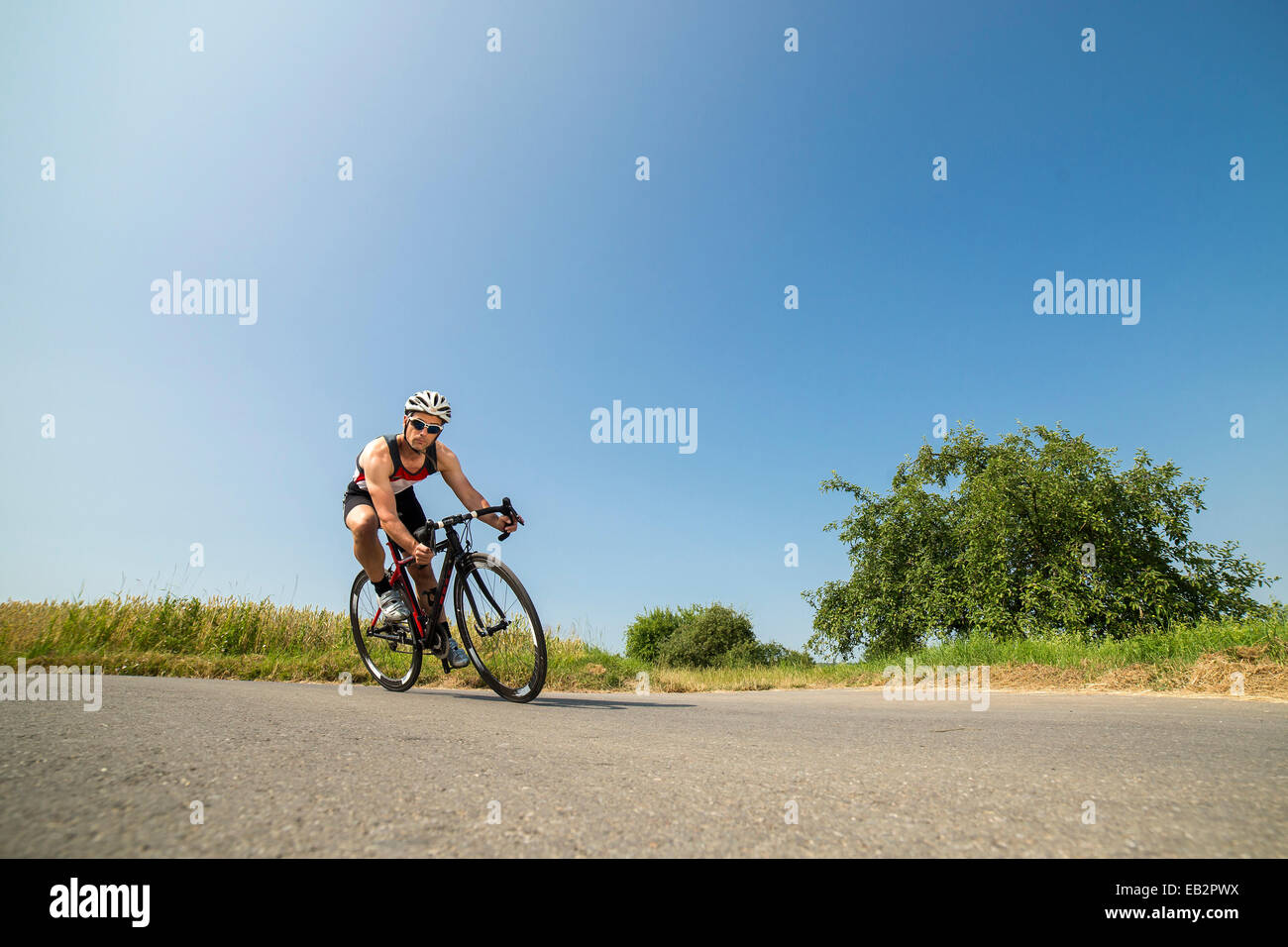 Man riding racing bicycle hi-res stock photography and images - Alamy