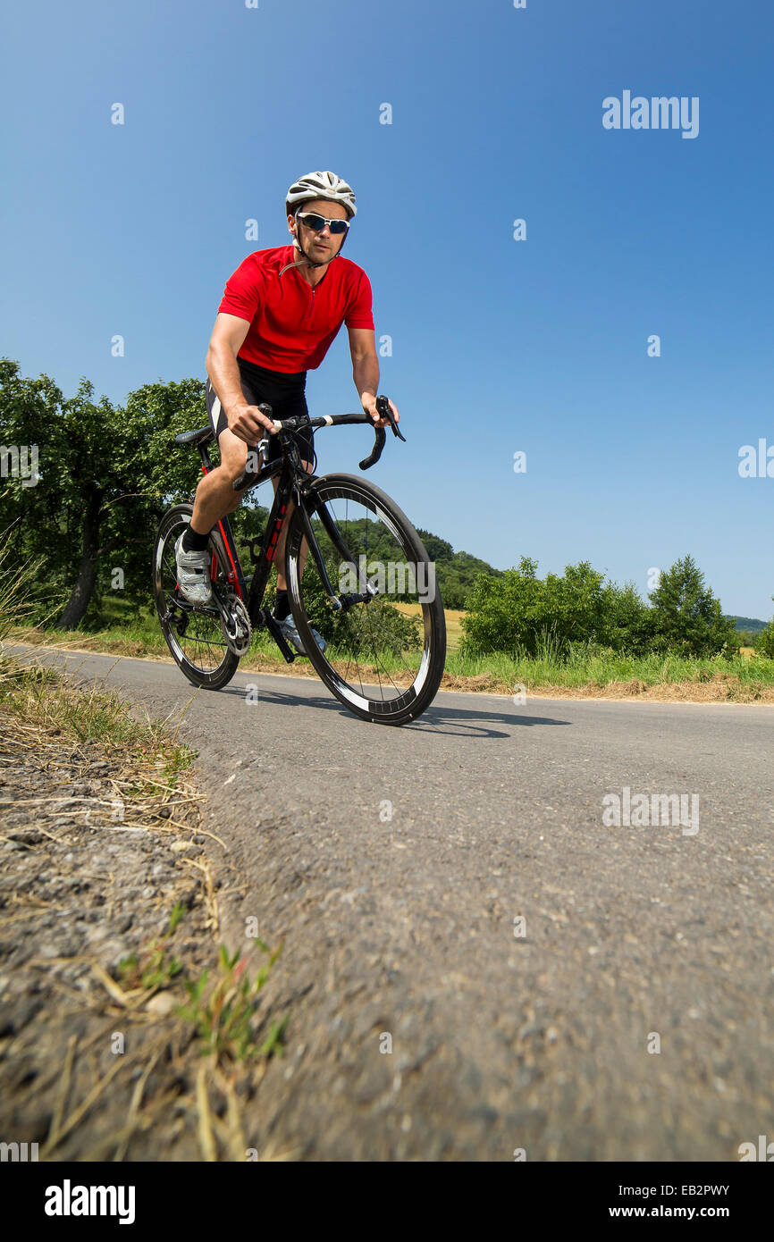 Man riding racing cycle hi-res stock photography and images - Alamy
