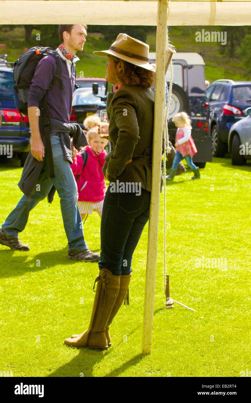 Katy Cropper leaning against a tent pole at Patterdale Dog Day near ...