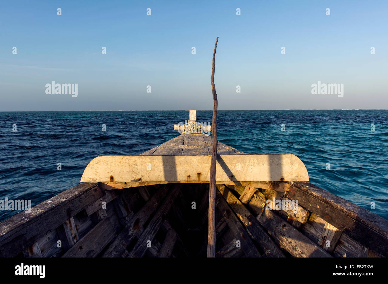 The timber bow of a fishing boat facing out to the Indian Ocean at ...